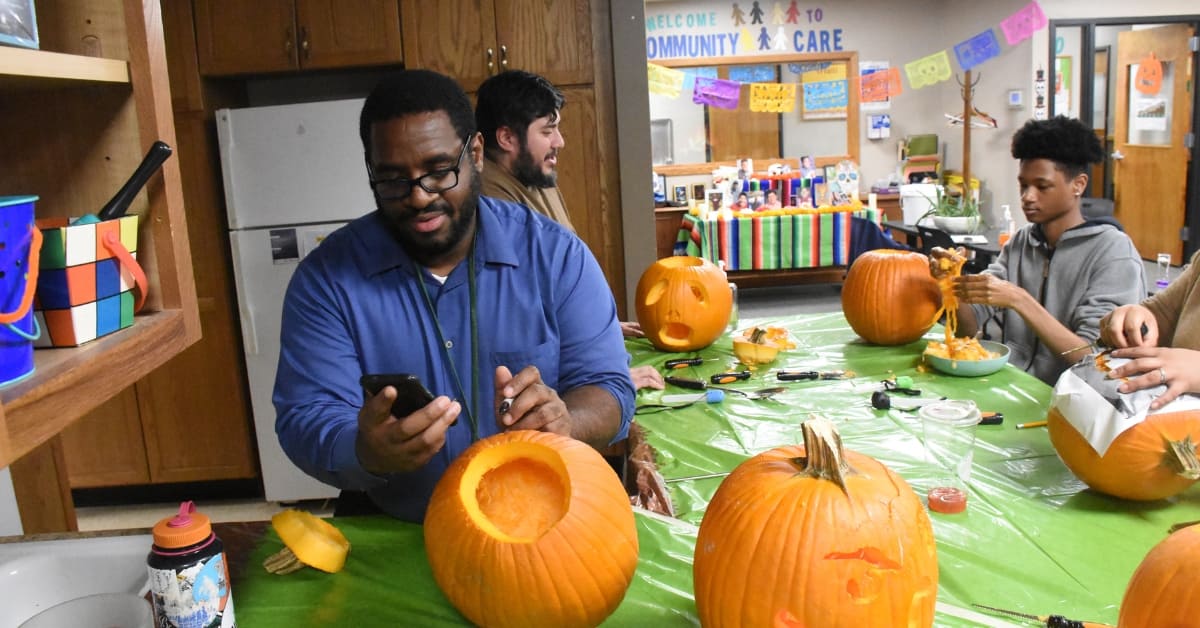 Pumpkin Carving Night Connects High School Scholars | Mercy Home for ...